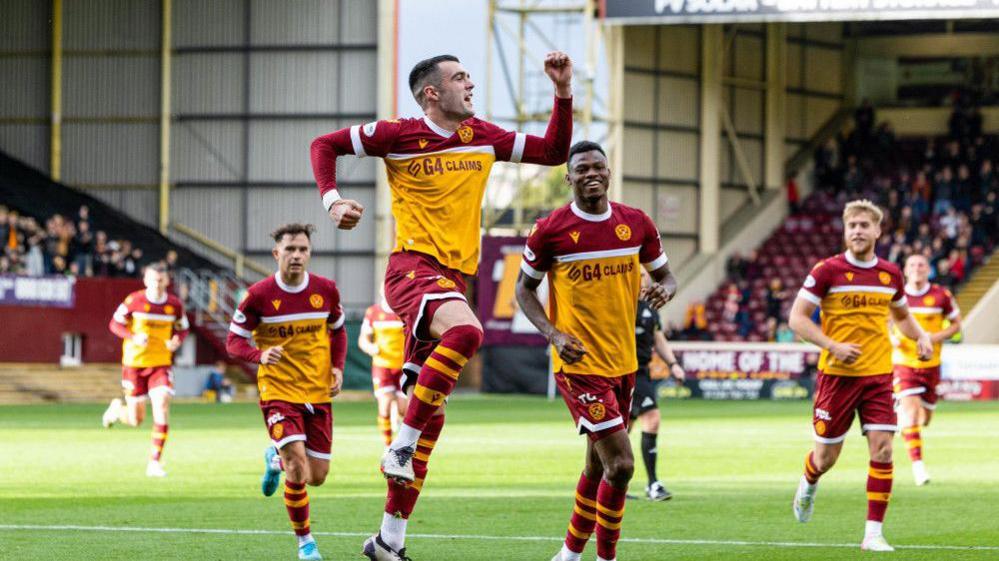 Dan Casey and Scott Tanser see red as Motherwell continued their fine ...